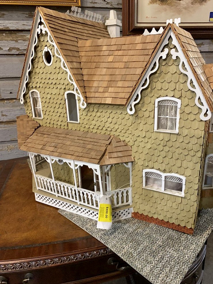 This dollhouse didn't come from a toy store—it's a miniature architectural marvel waiting for a new generation of imaginative caretakers.
