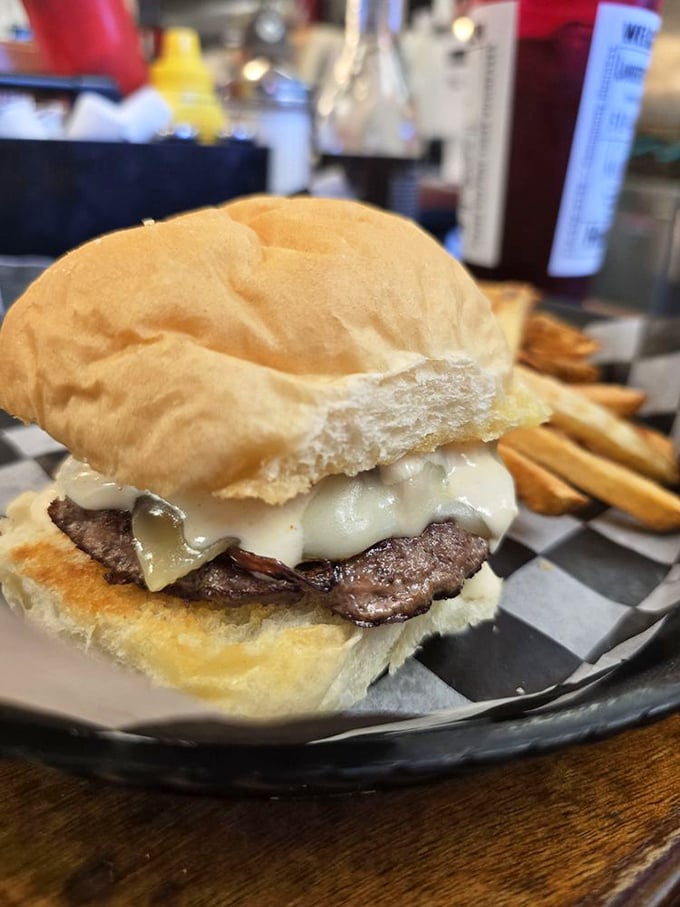 Simplicity perfected—a juicy patty, melted cheese, and a pillowy bun. Sometimes the classics don't need reinvention, just proper execution.