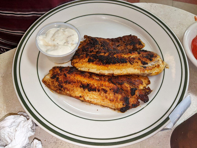 These blackened fish fillets aren't just dinner—they're proof that simple food done right beats fancy cuisine any day of the week.