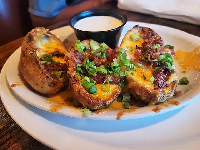 Potato skins that could make a cardiologist weep—gloriously loaded with cheese, bacon, and green onions. Diet books should include a chapter called "Exceptions."