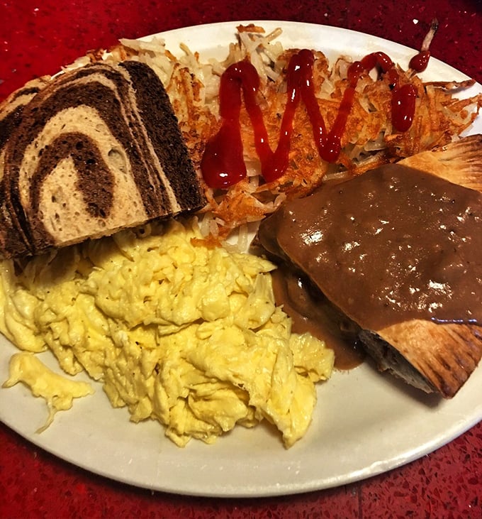 Breakfast perfection: marbled rye, farm-fresh eggs, and hash browns with that crispy exterior that makes you wonder if you've ever truly had hash browns before.