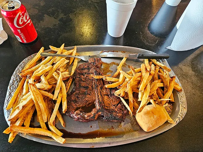 T-Bone steak and fries: The T-Bone that launched a thousand road trips. Notice those hand-cut fries—crispy vehicles designed specifically for sopping up precious steak juices.