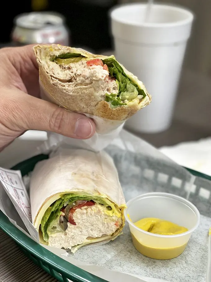 Wrap artistry that puts most museum exhibits to shame. Fresh ingredients nestled in a portable package with a side of mustard for dipping adventures.