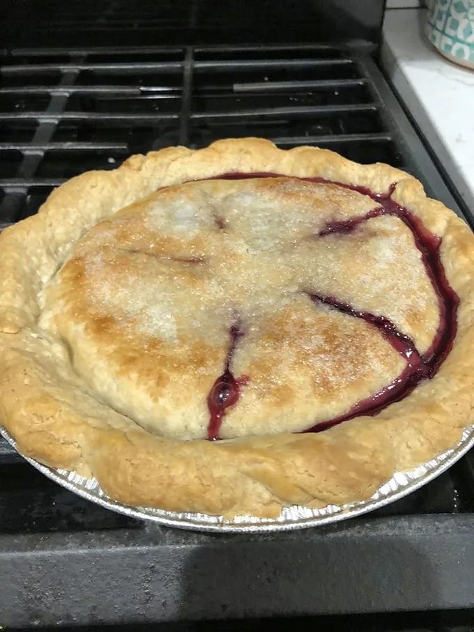 Witness the drama of berry juice escaping its buttery prison. This pie has stories to tell.
