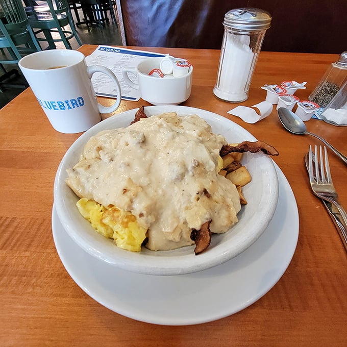 Gravity-defying gravy cascades over eggs and potatoes like a delicious waterfall. Comfort food that hugs you from the inside out.