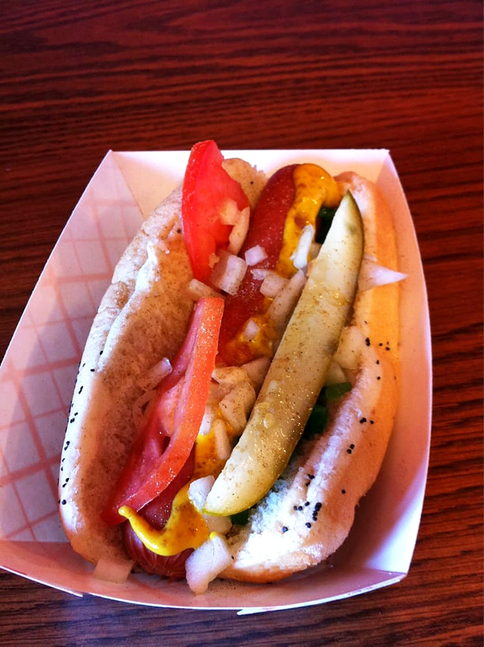 A Chicago-style hot dog is like a well-balanced committee meeting—every ingredient has important input, and ketchup is absolutely not invited.