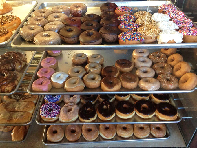 Rainbow sprinkles and glistening glazes create an edible art gallery. These aren't just donuts—they're little round ambassadors of joy.