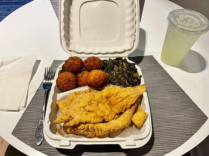 Behold the seafood dinner that launched a thousand return visits – cornmeal-crusted fish, perfectly fried hush puppies, and greens that mean business.