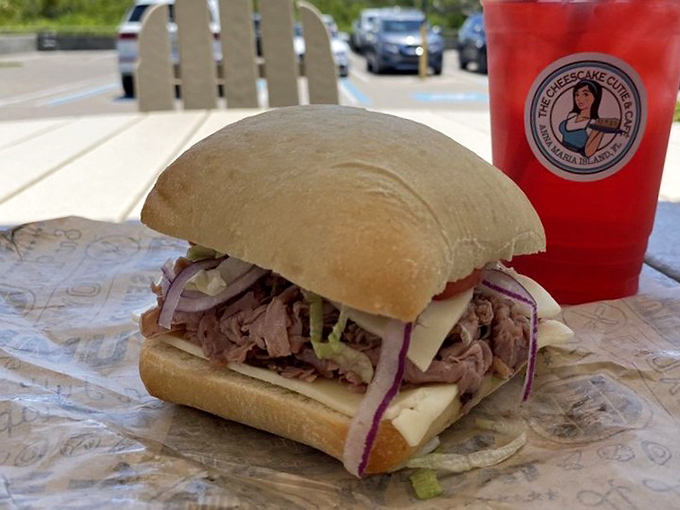 Behold the sandwich that launched a thousand napkins—tender roast beef, sharp cheese, and crisp veggies on bread that knows its purpose.