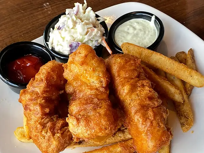 Some signature dishes whisper; this one belts out a Broadway finale. The fish is so fresh it might still have its swimming license.