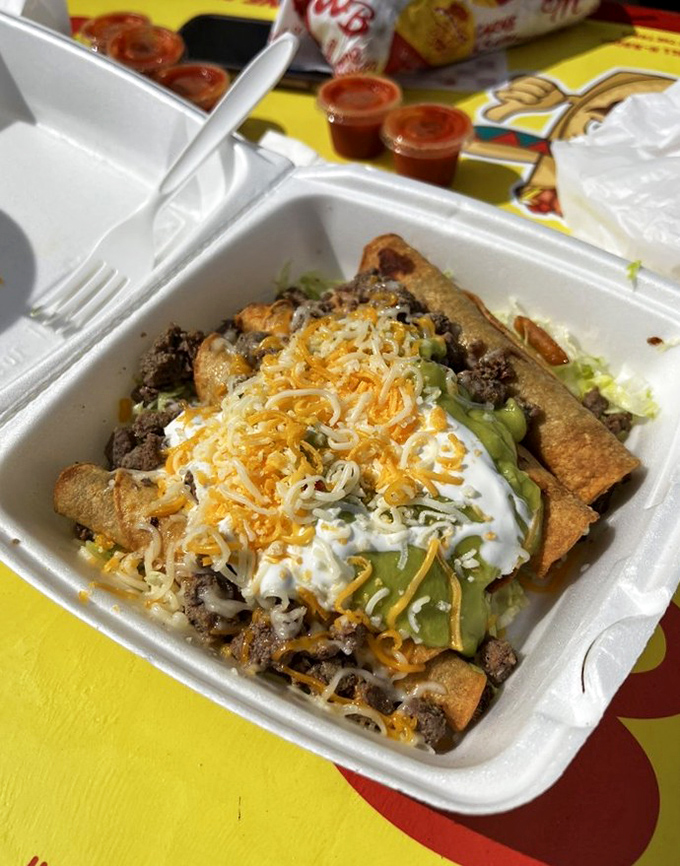 Taquitos lined up like delicious soldiers, crispy on the outside and tender within – the textural dream team.