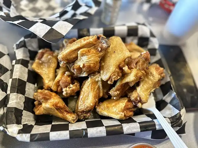 These wings aren't just crispy – they're what other wings aspire to be when they grow up. Golden, glistening, and ready for their close-up.
