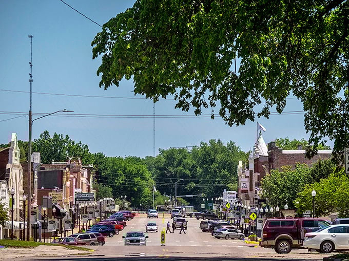 Council Grove's riverside charm captures the essence of Santa Fe Trail history. That bridge invites you to cross into another era.