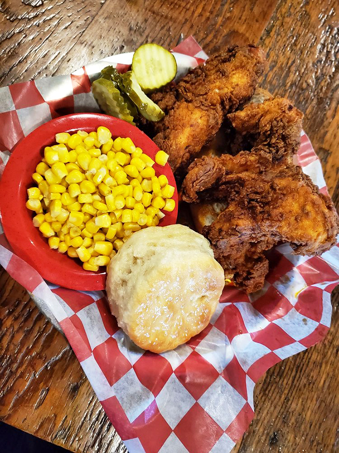 These crispy chicken pieces with sweet corn and a biscuit aren't just a meal—they're edible therapy after a long day of adulting.