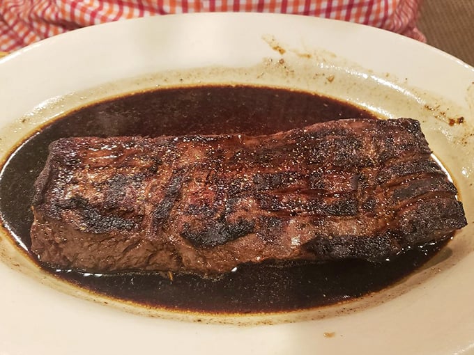 The Romanian steak arrives like a celebrity making an entrance—perfectly grilled, impossibly juicy, and ready for its close-up. No filter needed.