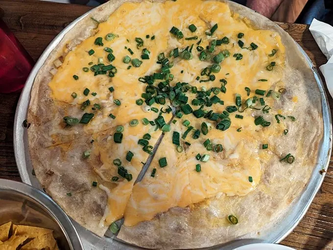 The cheese crisp—Arizona's answer to pizza—topped with fresh green onions that add both color and zip.
