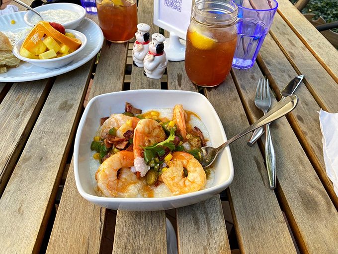 Outdoor dining with shrimp and grits—because vitamin D and vitamin "Delicious" make the perfect pairing on a sunny Colorado day.