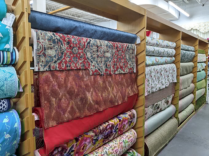 Walking through these aisles feels like stepping into a textile museum where touching the exhibits isn't just allowed—it's encouraged!
