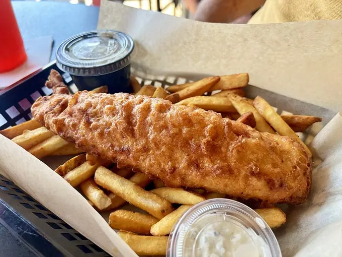 This fish and chips doesn't need a British accent to impress—just golden batter, flaky white fish, and fries worth fighting over.