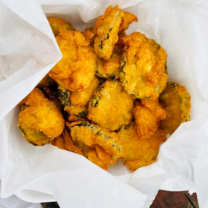 Golden-fried pickle chips—the unexpected hero of appetizers. Crunchy, tangy, and utterly addictive, they're the potato chip's sophisticated cousin.
