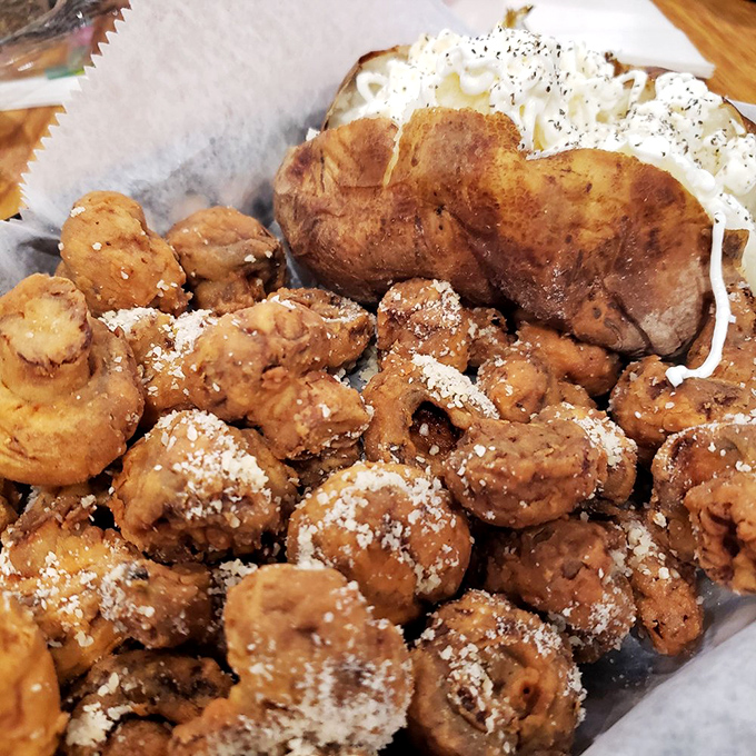 Fried mushrooms dusted with parmesan—proof that vegetables can be convinced to abandon their health food status for something greater.