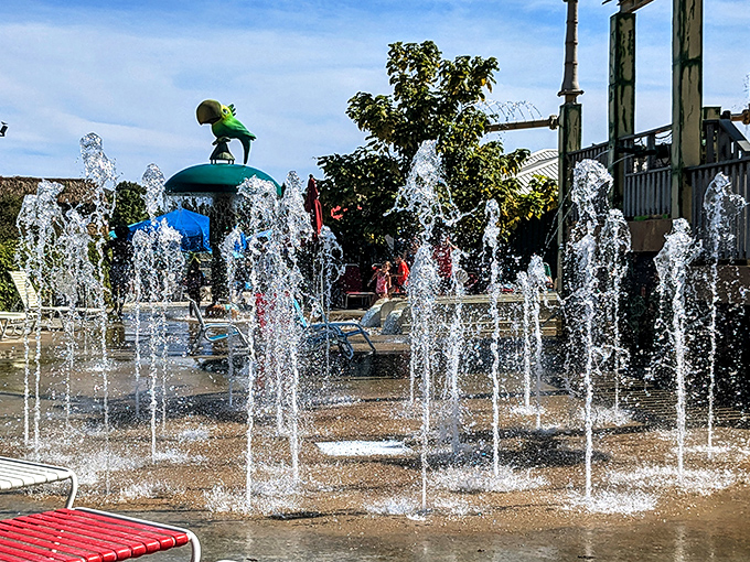 Fountains create an impromptu dance of water for delighted youngsters – childhood joy in its purest, most refreshing form.
