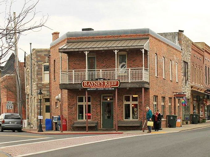 Rayne's Reef isn't just a corner building—it's a time machine disguised as a diner. Those brick walls have witnessed decades of first dates, family celebrations, and perfect milkshakes.