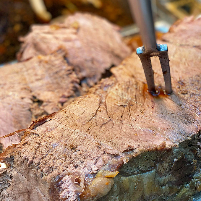 Slow-roasted beef that doesn't just fall apart—it practically surrenders to your fork before you even touch it.