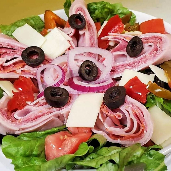 When a salad looks this good, even dedicated carnivores might consider a vegetable detour. Those olives are playing the starring role they deserve.