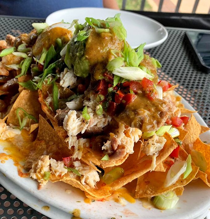 Seafood nachos that make you question why you ever settled for just cheese and jalapeños. This is what nachos dream of becoming.