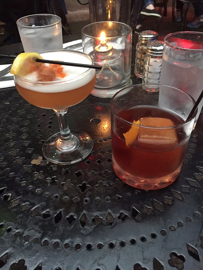 Cocktails at Arnold's aren't just drinks, they're liquid conversation starters—served with candlelight that makes everyone look like they've got good stories to tell.