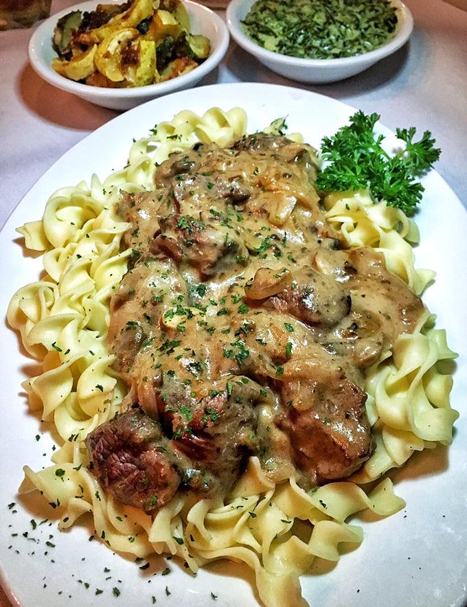 Beef Stroganoff over egg noodles—comfort food that whispers, "Put on your stretchy pants, darling. We're going to need them tonight."