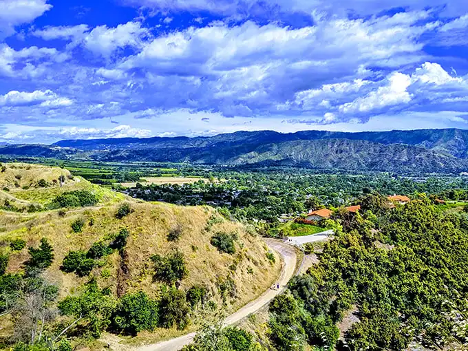 From Valley View Preserve, Ojai unfolds like a miniature model village, with mountains standing guard and the valley stretching toward the distant Pacific.