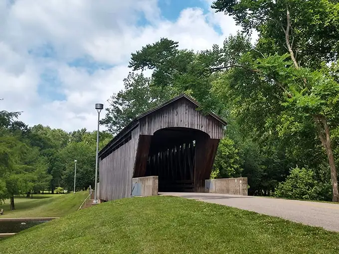 Not all covered bridges lead to Madison County—this weathered beauty stands as both functional passage and time portal to Indiana's pastoral past.