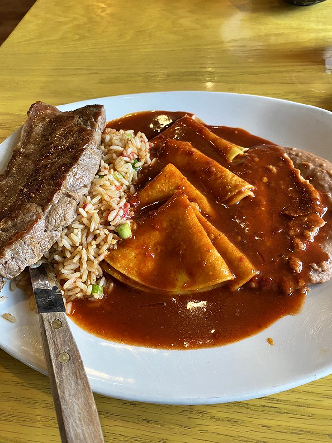 Rice that's actually flavorful (a miracle!), beans with character, and what appears to be a tamale and enchilada having the world's most delicious summit meeting.