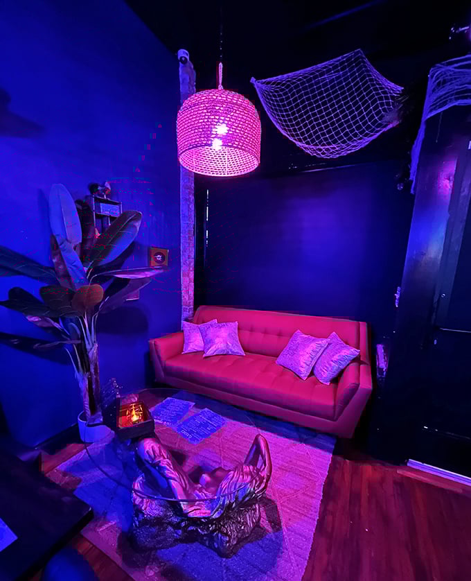 The coral couch corner looks like it was stolen from Poseidon's living room – complete with fishing nets that caught nothing but good vibes.