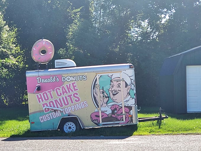 The donut truck—proof that good things come in mobile packages. A nostalgic rolling billboard for happiness with sprinkles on top.