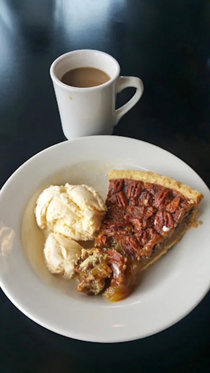 Pecan pie and ice cream: proof that some relationships are simply meant to be, creating a romance more satisfying than any Hollywood movie.