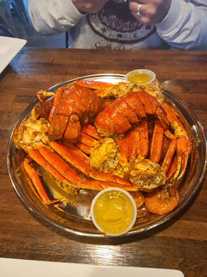 Snow crab clusters that demand to be noticed. The generous portions and seasoning make this dish Instagram-worthy before the first crack of a shell.
