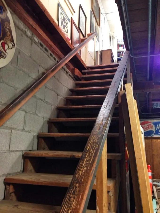 These worn wooden stairs have carried countless treasure hunters to upper-level discoveries—each step a prelude to potential finds.