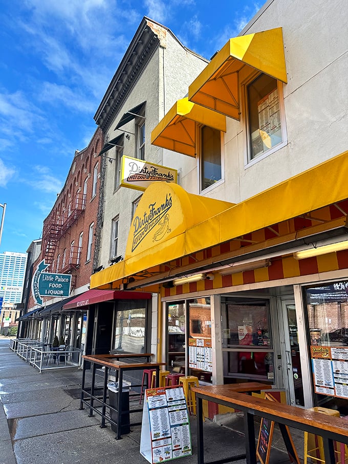 Dirty Frank's bright yellow awning stands out in Columbus like a hot dog wearing a tuxedo – unpretentious yet unmistakably special.