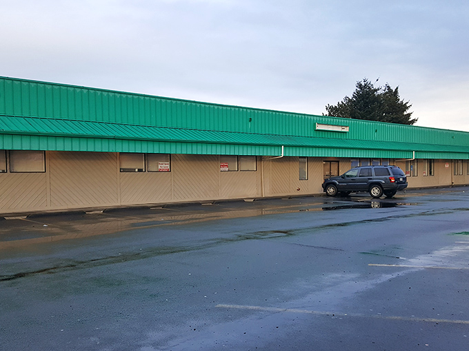 Lancaster's no-frills exterior is the secret handshake of serious bargain hunters—green roof, beige walls, infinite possibilities inside.