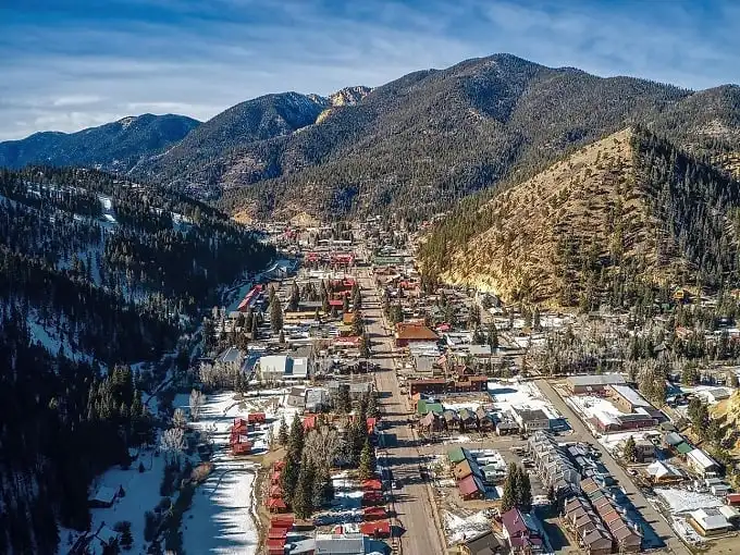 Red River's main street could be the poster child for "charming mountain town" – complete with rustic storefronts and pine-covered peaks.