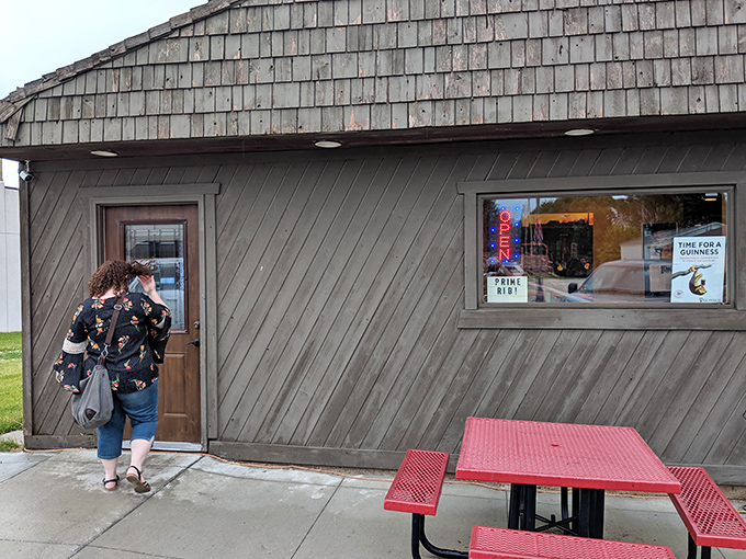 That cow silhouette isn't just decoration—it's a beacon of hope for hungry travelers seeking beef nirvana in small-town Iowa.