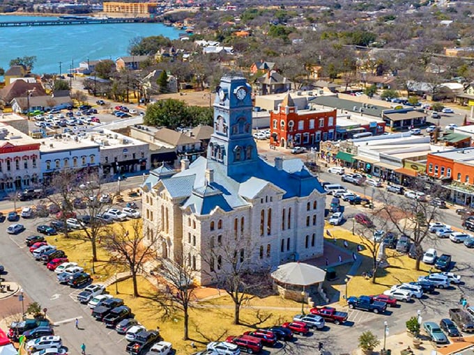 The clock tower stands as Granbury's timekeeper, watching as modern visitors enjoy this perfectly preserved piece of Texas past.