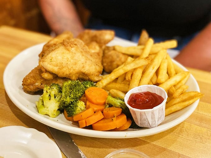 Fried chicken that would make your grandmother both jealous and proud. Crispy outside, juicy inside—the textbook definition of doing it right.
