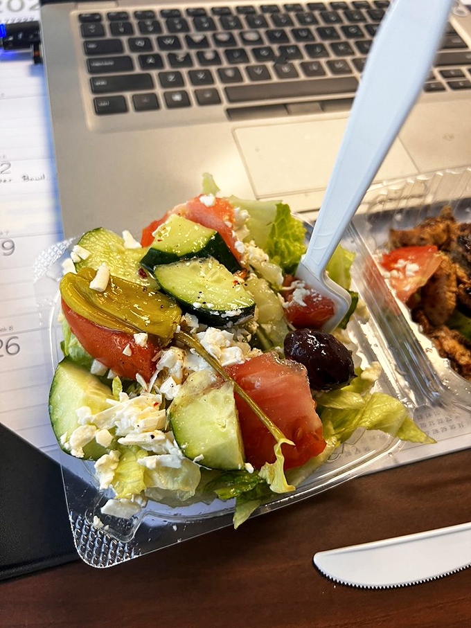 This Greek salad isn't just a side dish—it's vacation in a plastic container. Feta, olives, and veggies having their own little Mediterranean summit.