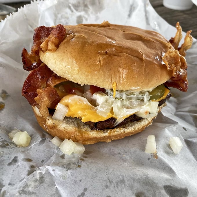 When your burger comes dressed "all the way" with Brooks' famous chili, mustard, and onions—napkins become essential survival gear.