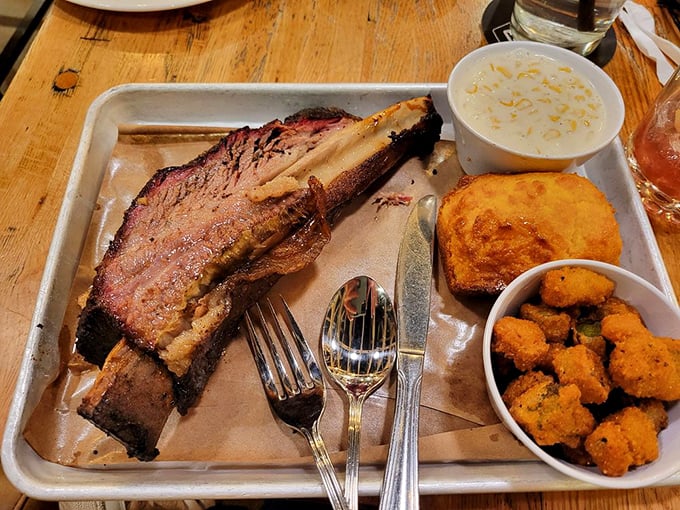 That beef rib isn't just dinner—it's prehistoric satisfaction on a tray, making you feel like Fred Flintstone at a five-star cave restaurant.