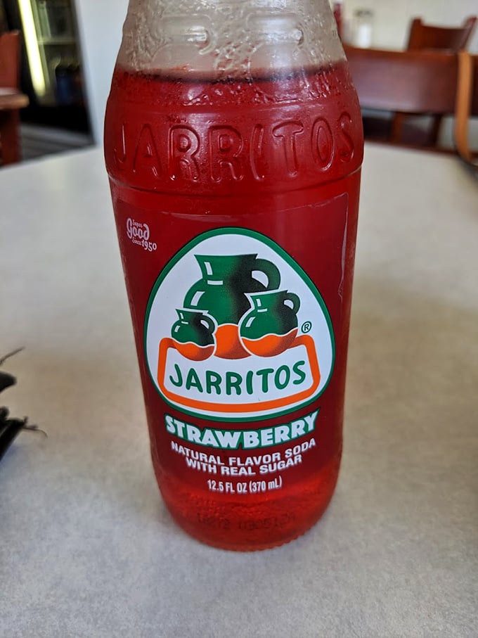 That strawberry Jarritos isn't just a soda—it's like Mexico bottled the essence of summer to wash down your meal.